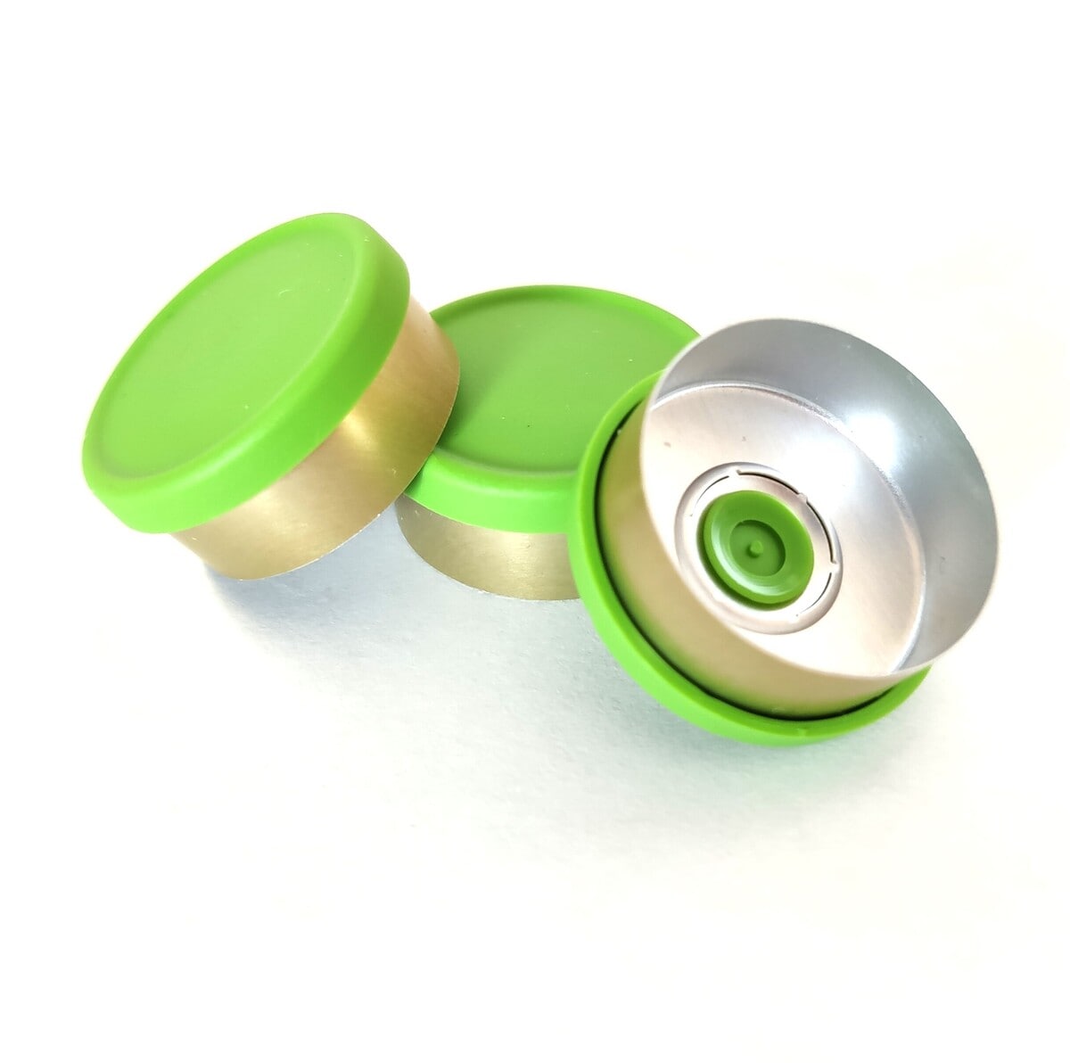 Combined aluminum/plastic caps